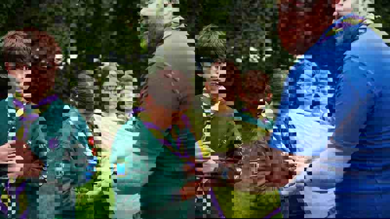 Cubs uniform and badge placement | Scouts